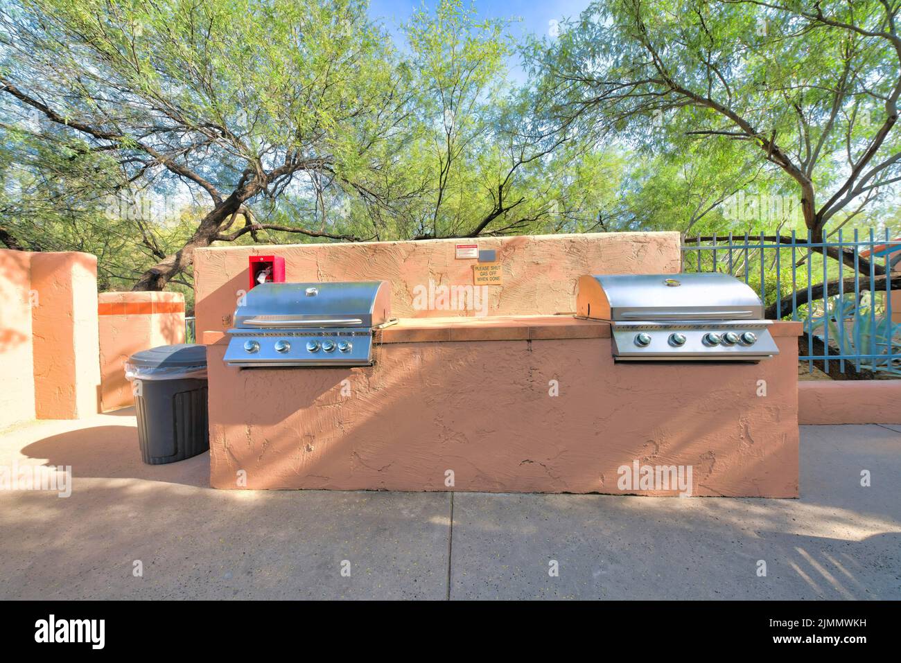 Two stainless steel gas barbecue grills in public at Tucson, AZ. Bbq ...