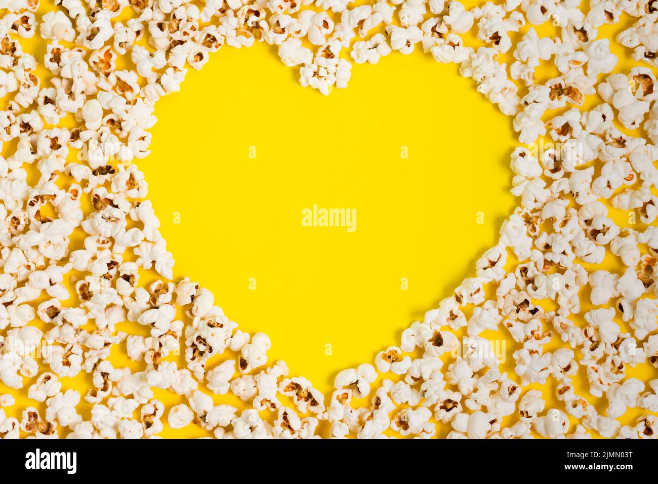 Top view popcorn heart shape Stock Photo - Alamy