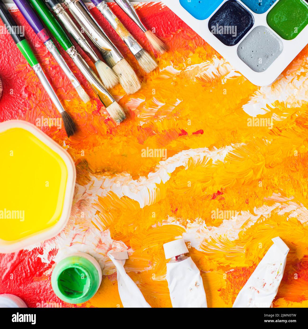 Brushes pigments abstract painting Stock Photo - Alamy
