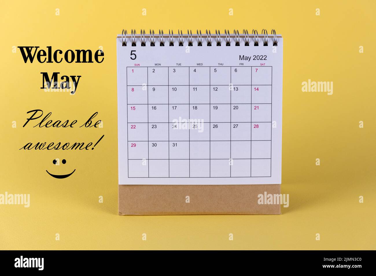 May 2022 calendar on yellow background isolated with positive text ...
