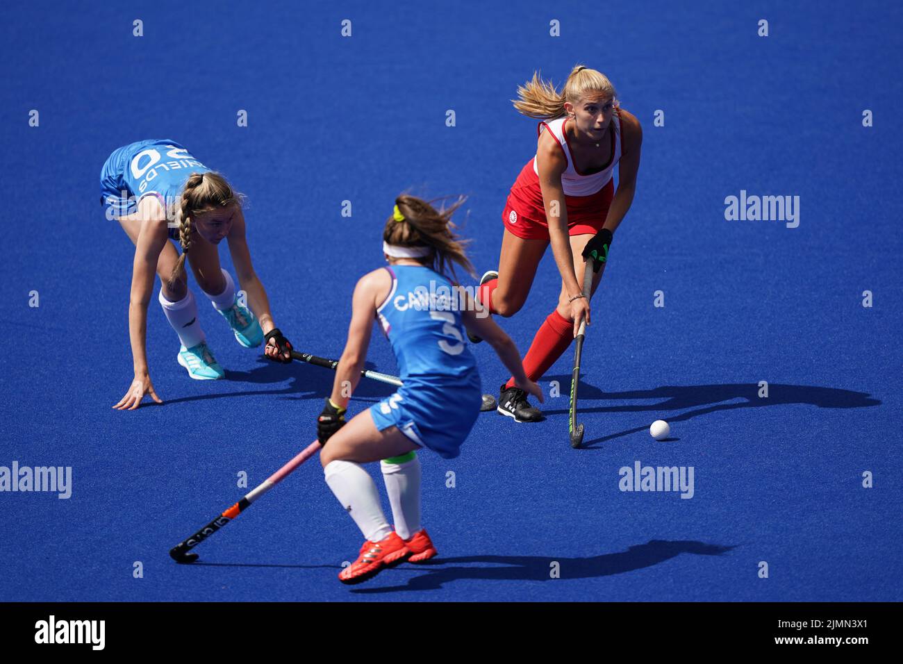 Canada's Grace Delmotte gets away from Scotland's Bronwyn Shields (left ...