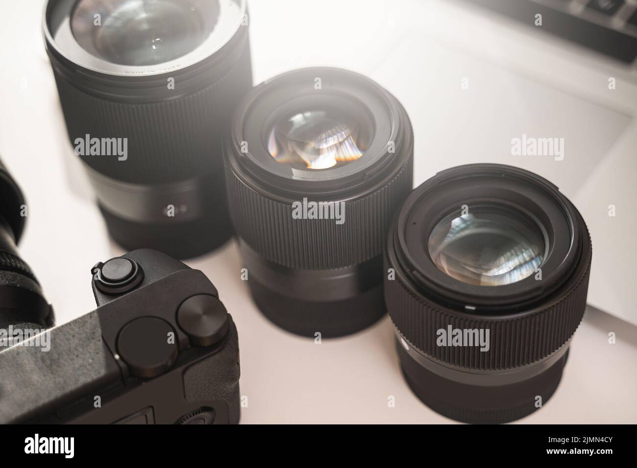 Workplace with a modern equipment for photography. Mirrorless camera ...