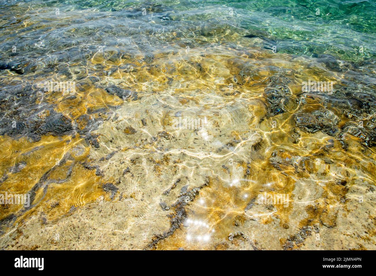 Rocky beach rippled clear hi-res stock photography and images - Alamy