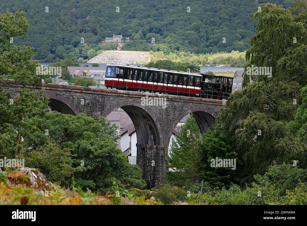 A diesel train on Snowdon Mountain Railway seen taking passengers up to ...