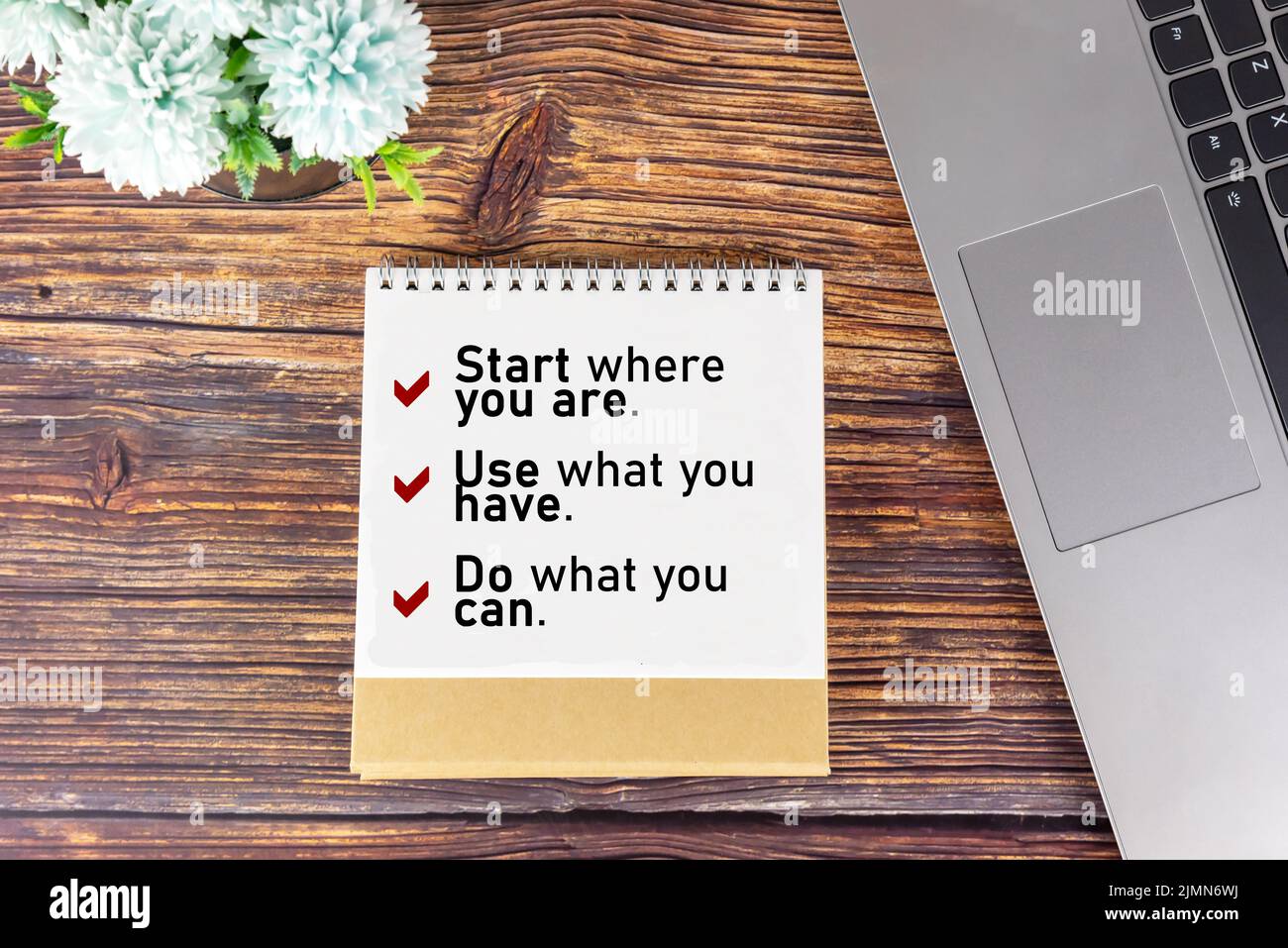 Positive motivational messages on the rustic wooden table with laptop ...
