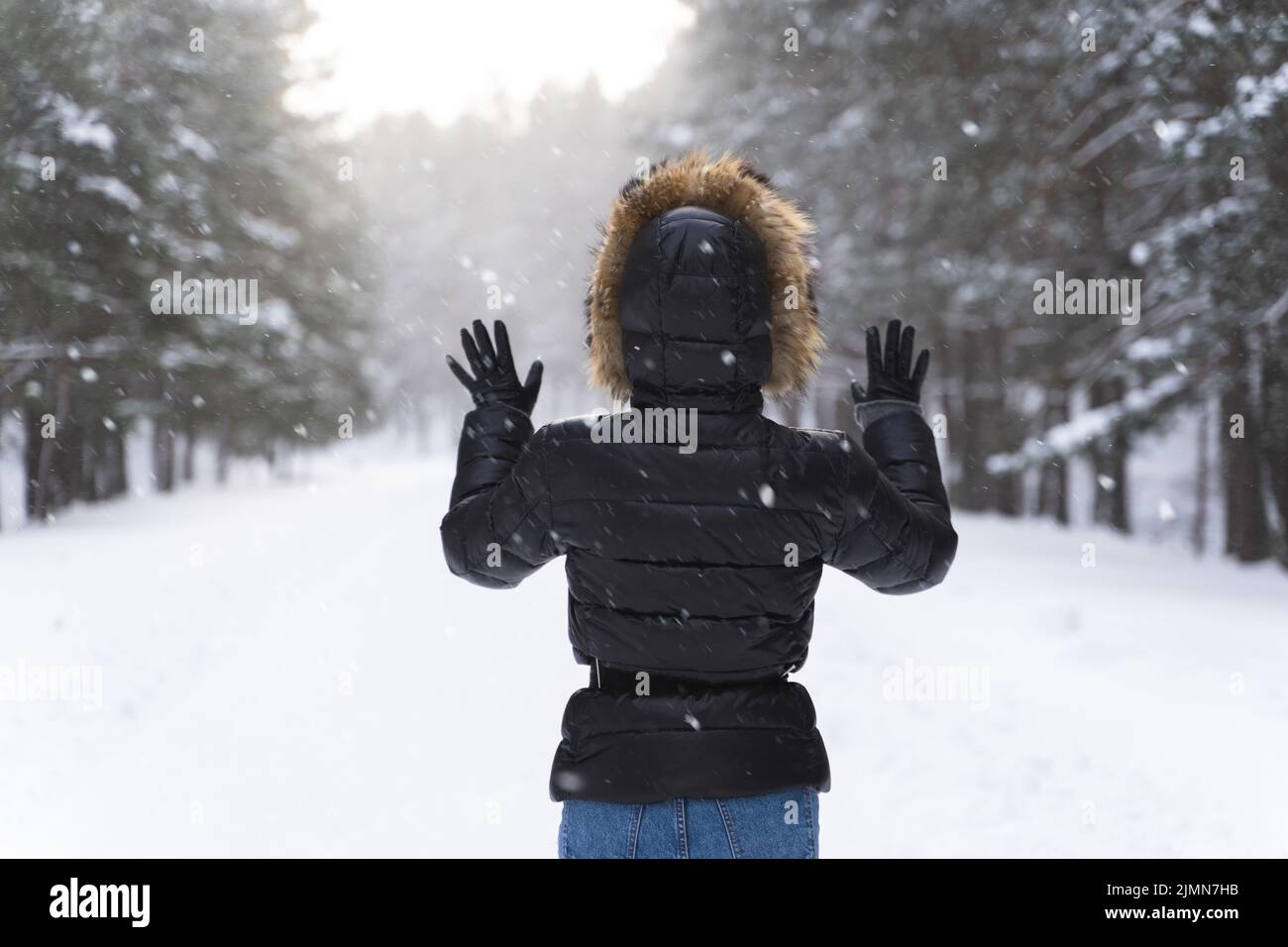 Person walking wearing white jacket hi-res stock photography and images ...