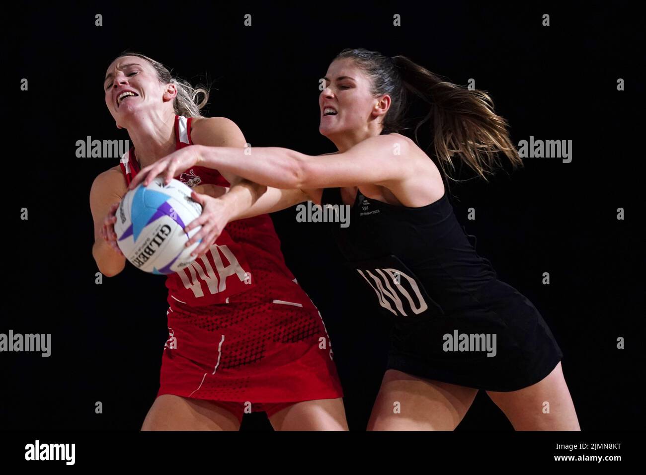 England's Natalie Metcalf (right) and New Zealand's Kate Heffernan ...