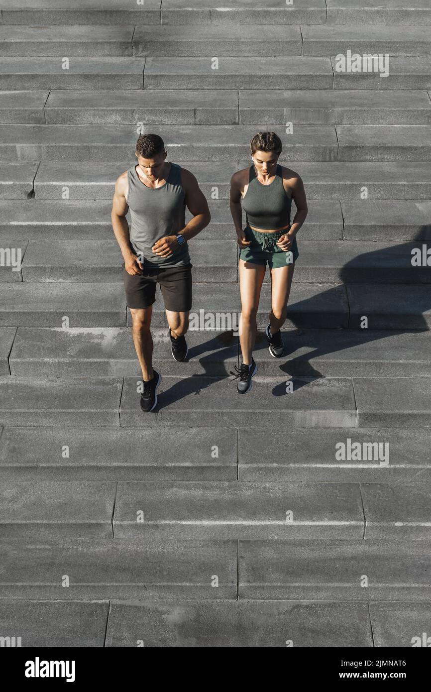 Running up stairs and team hi-res stock photography and images - Alamy