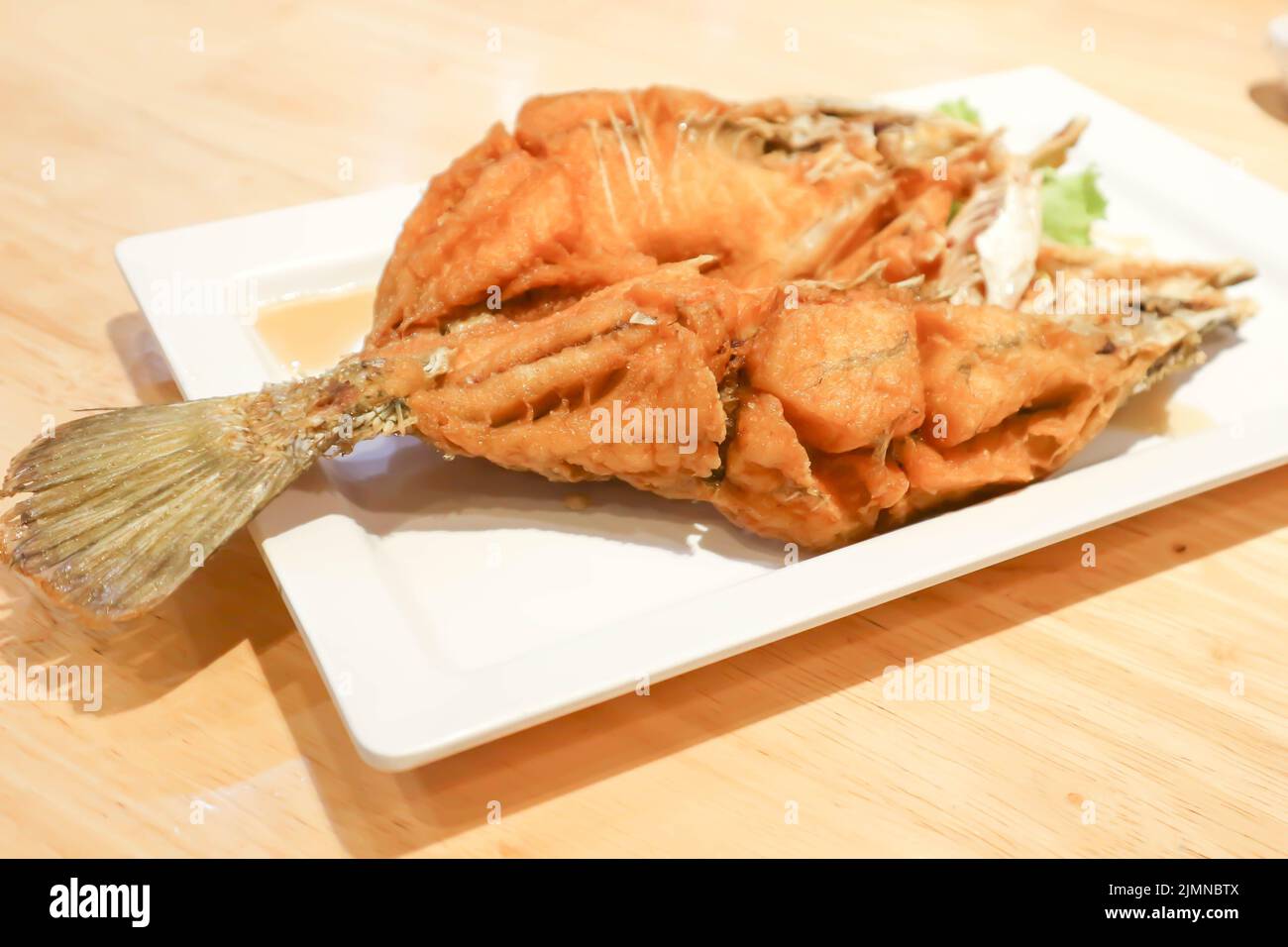 fried fish ,deep fried fish or fried striped bass fish Stock Photo - Alamy