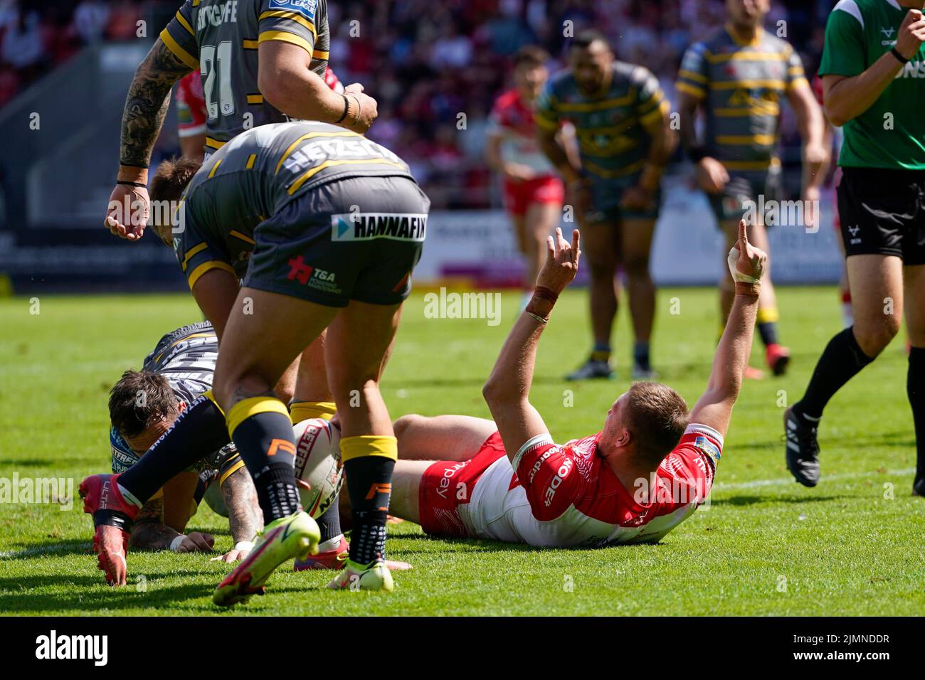 Joe Batchelor #12 of St Helens celebrates after scoring a try in St ...