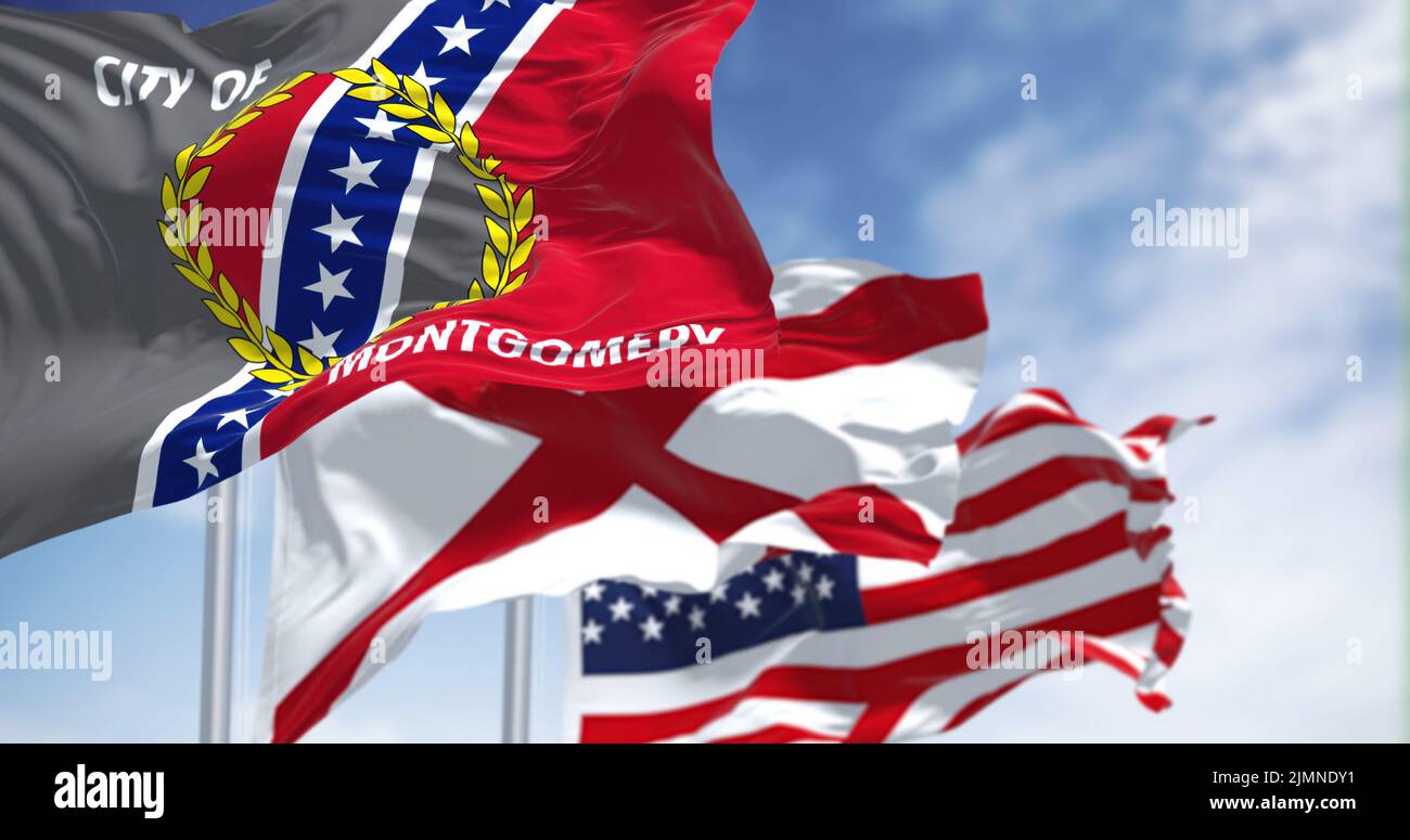 The flags of the Alabama state and United States of America waving in ...