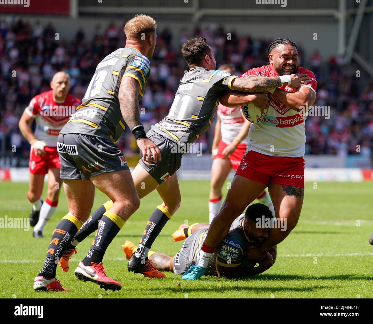 Konrad Hurrell #23 of St Helens drives for the line Stock Photo - Alamy