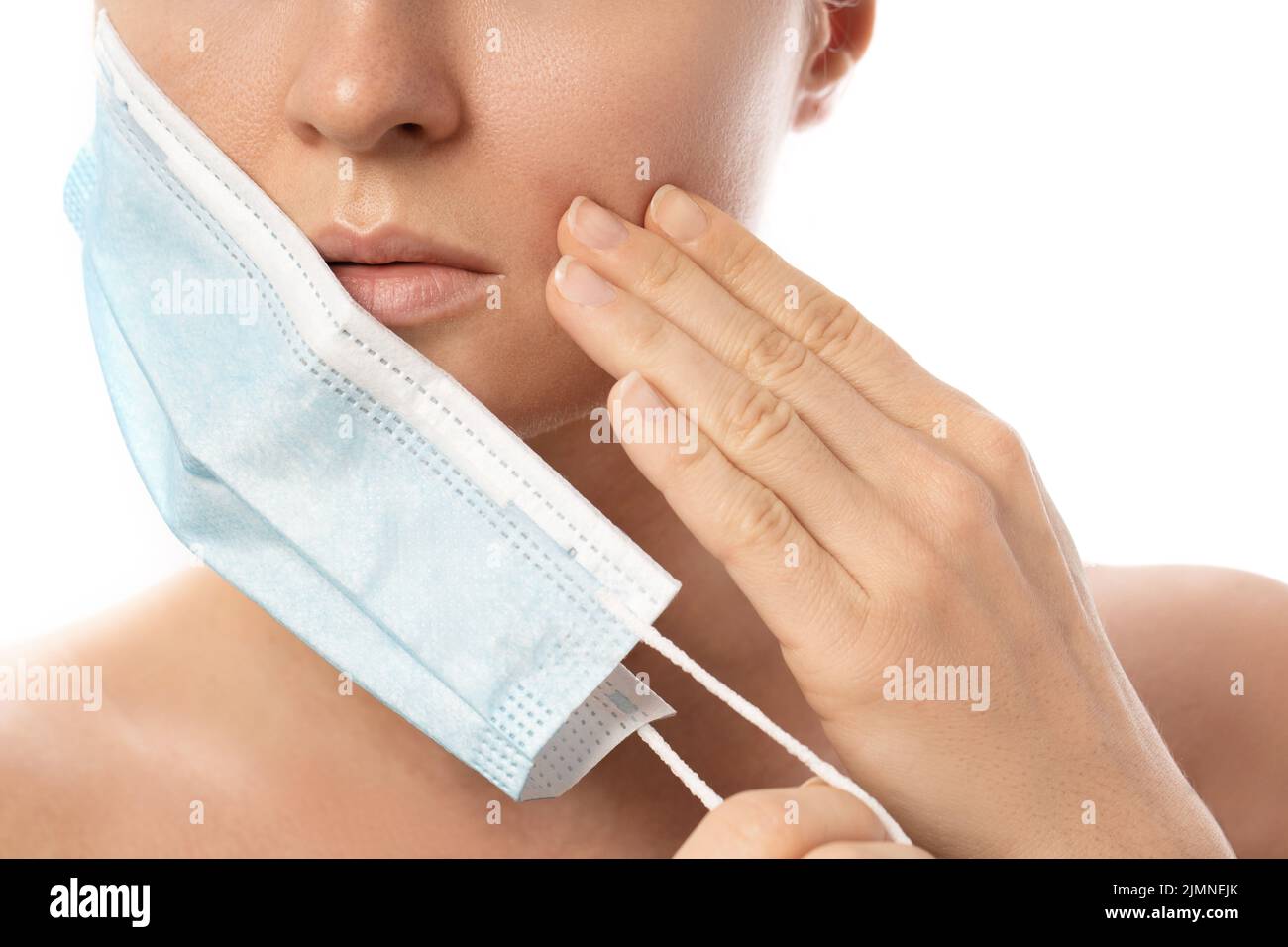 Maskne - acne breakouts from wearing a face mask Stock Photo - Alamy