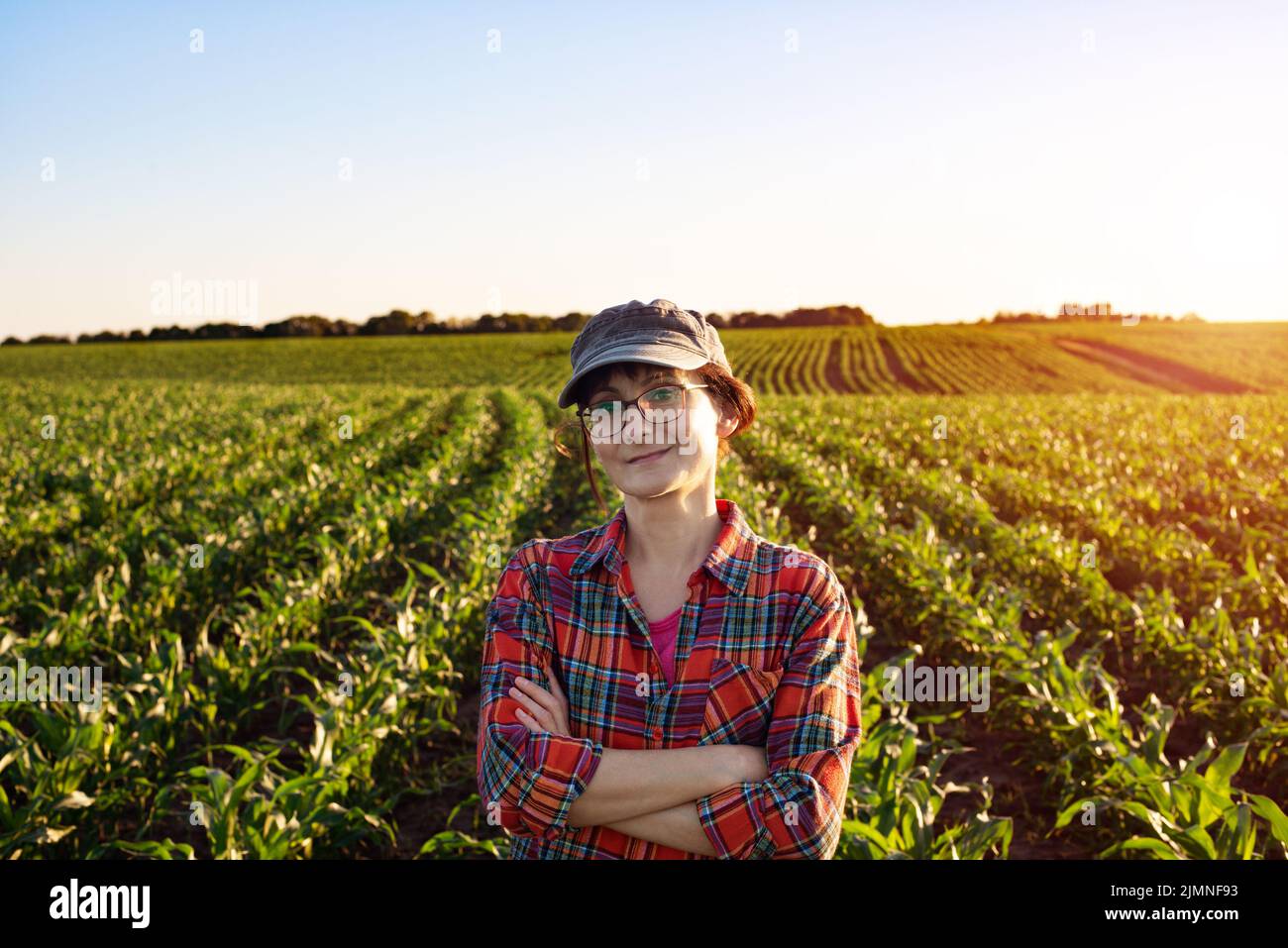 Middle age female caucasian confident satisfied smiling farm worker ...