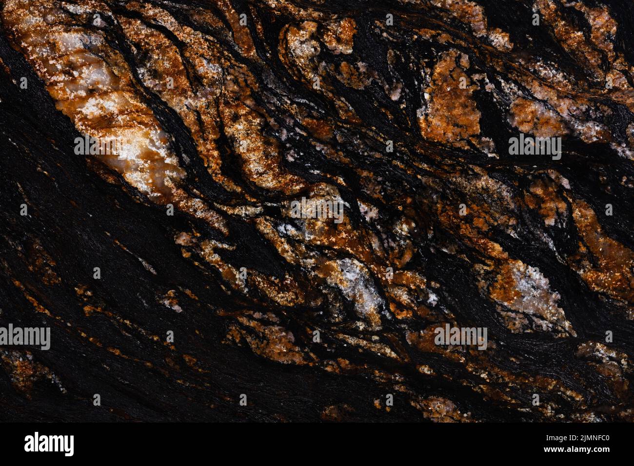 Black Magma granite texture in dark color with brown surface Stock ...