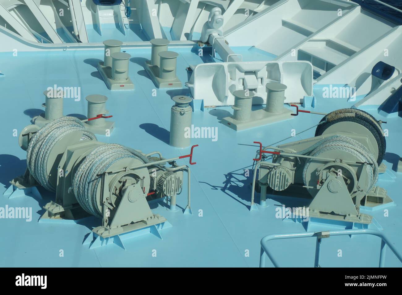 The anchor, anchor windlass and winches on the main deck of a cruise ...