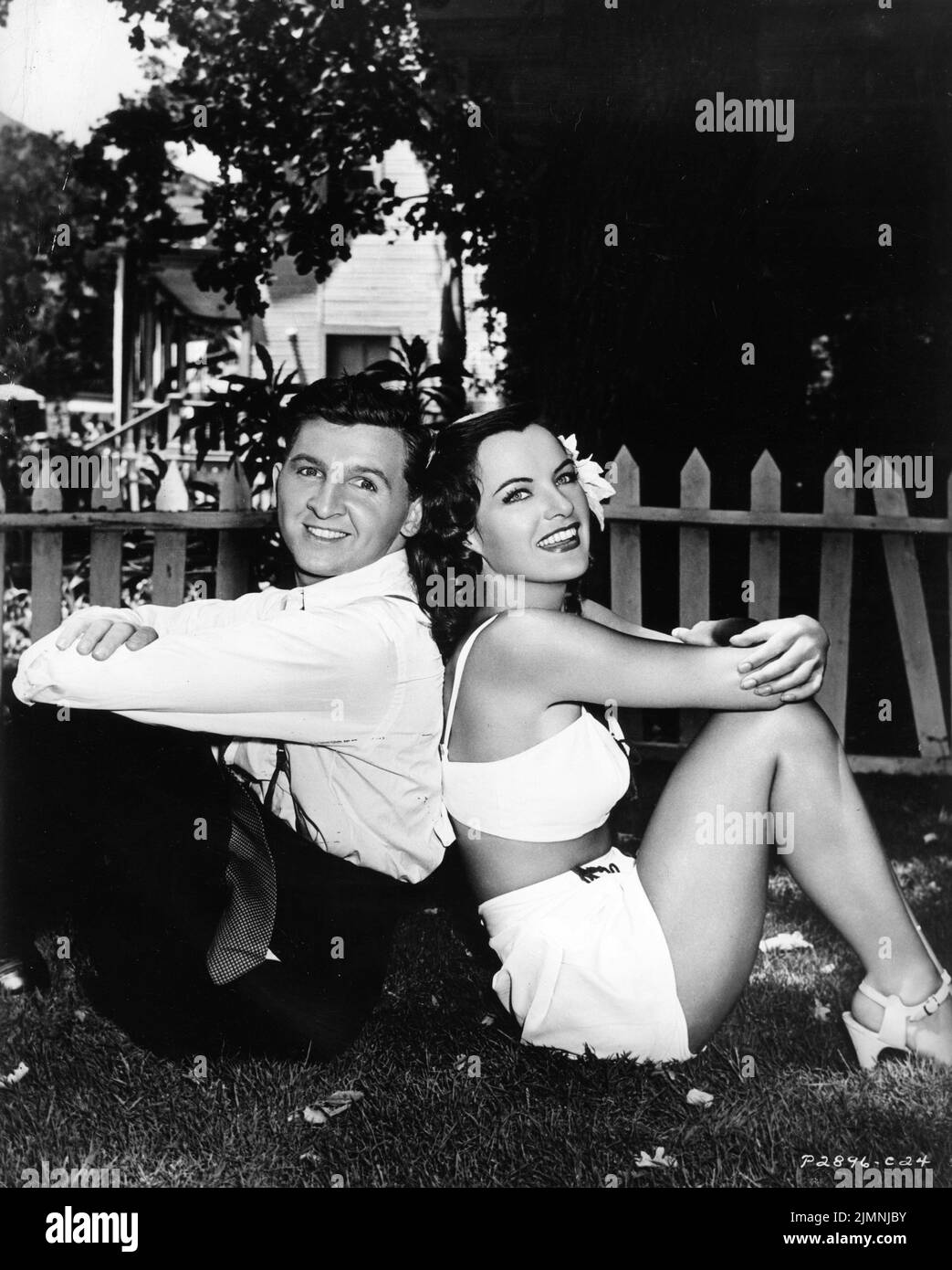 EDDIE BRACKEN and ELLA RAINES on set candid during break in filming of HAIL THE CONQUERING HERO ...