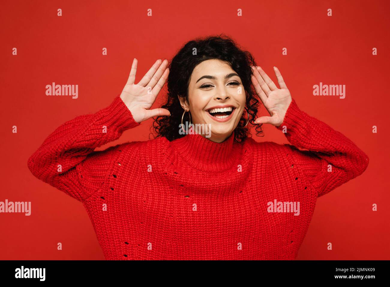 Medium shot happy model posing Stock Photo - Alamy