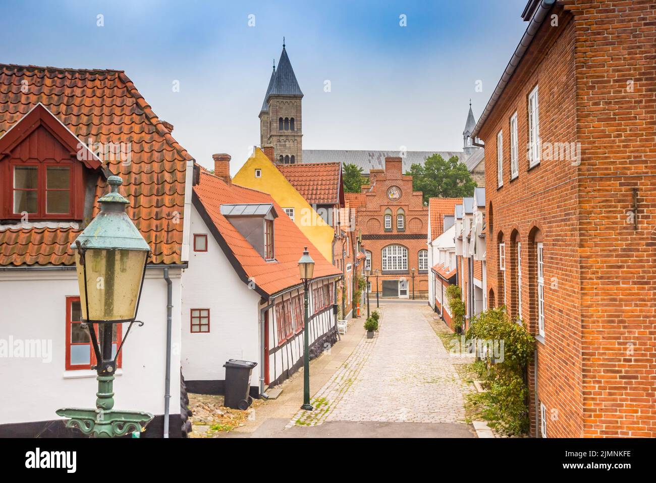 Street with old houses leading to the Domkirke church in Viborg ...