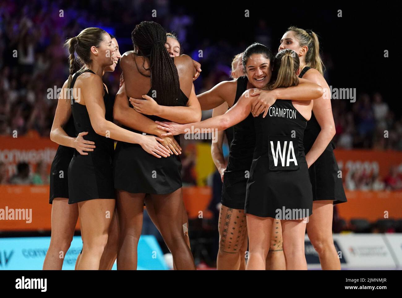 New Zealand's Gina Crampton (right) hugs team-mate after Netball ...