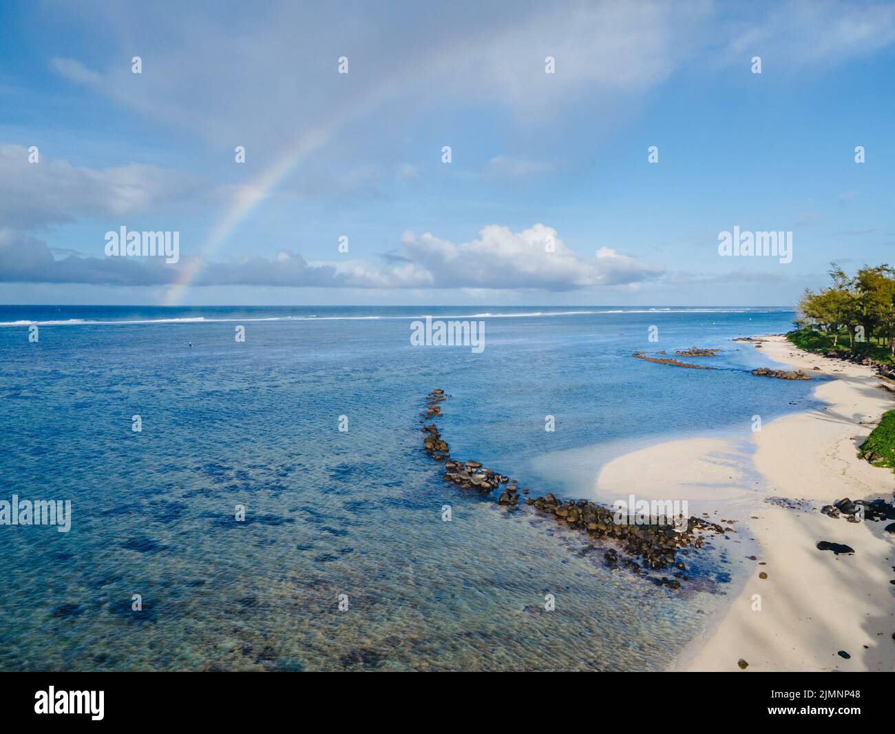 Drone aerial view of ocean with rainbow, rainbow in ocean Mauritius ...