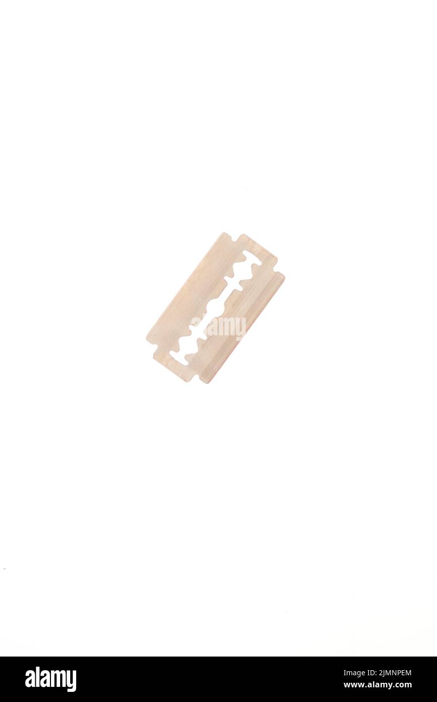 Close-up image of razor blade on white background Stock Photo - Alamy