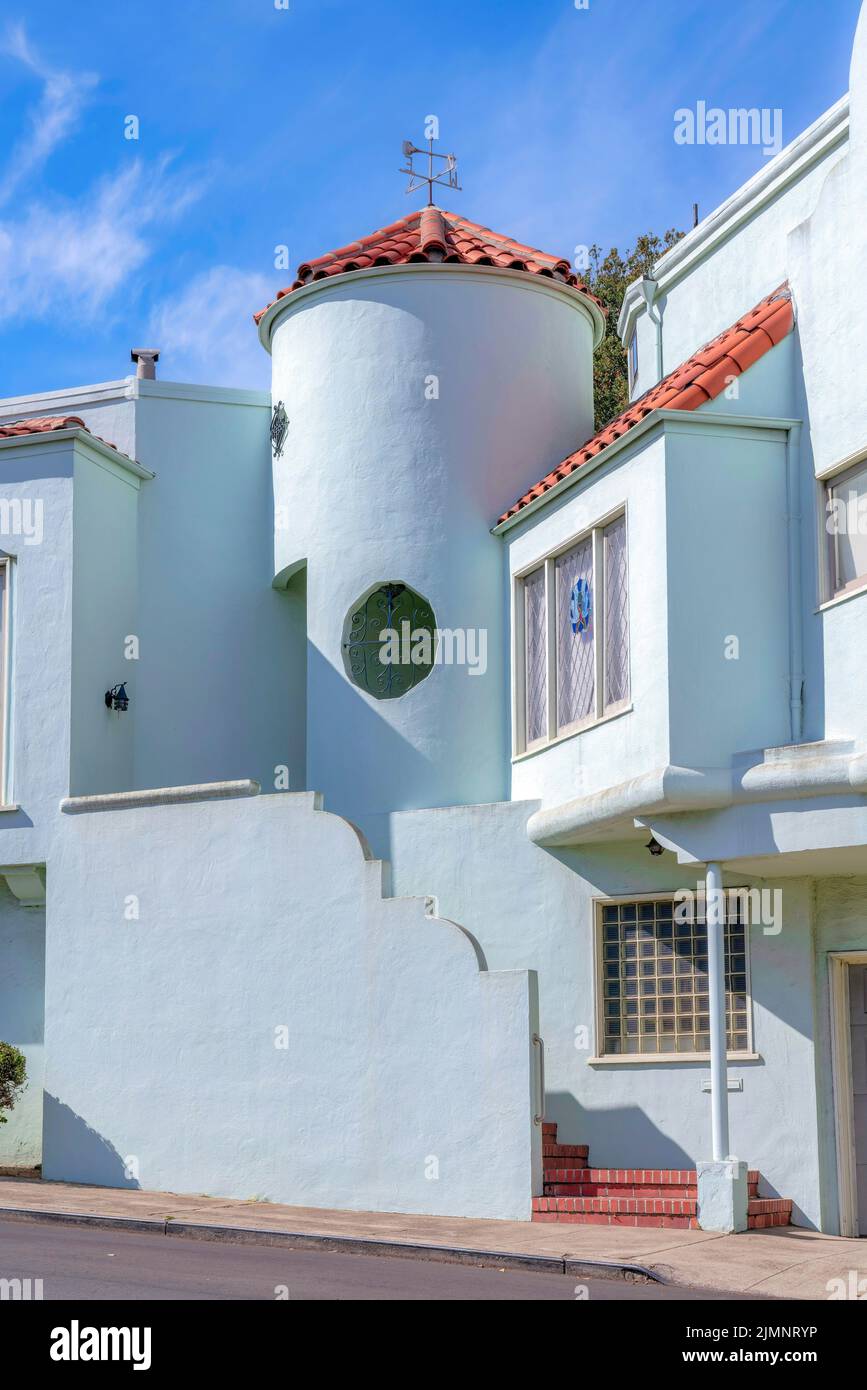 Facade of a gray mediterranean style house with concrete tile roofs ...