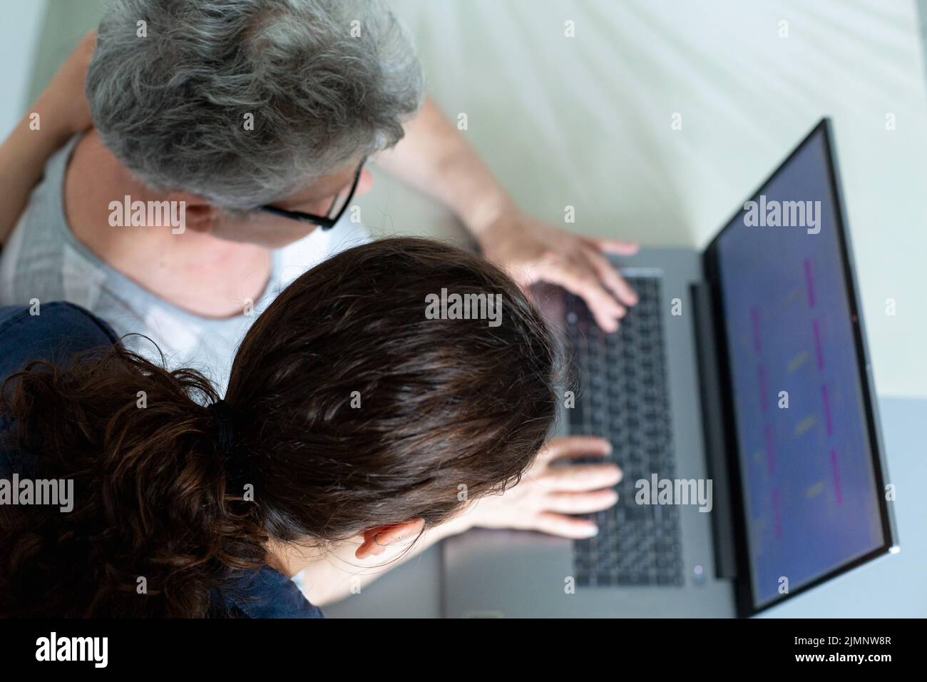 Old women using computer hi-res stock photography and images - Alamy