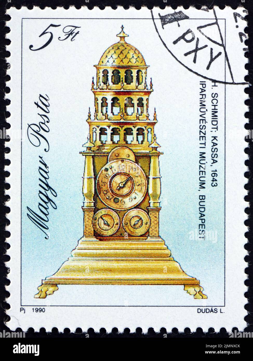 HUNGARY - CIRCA 1990: a stamp printed in Hungary shows table clock ...