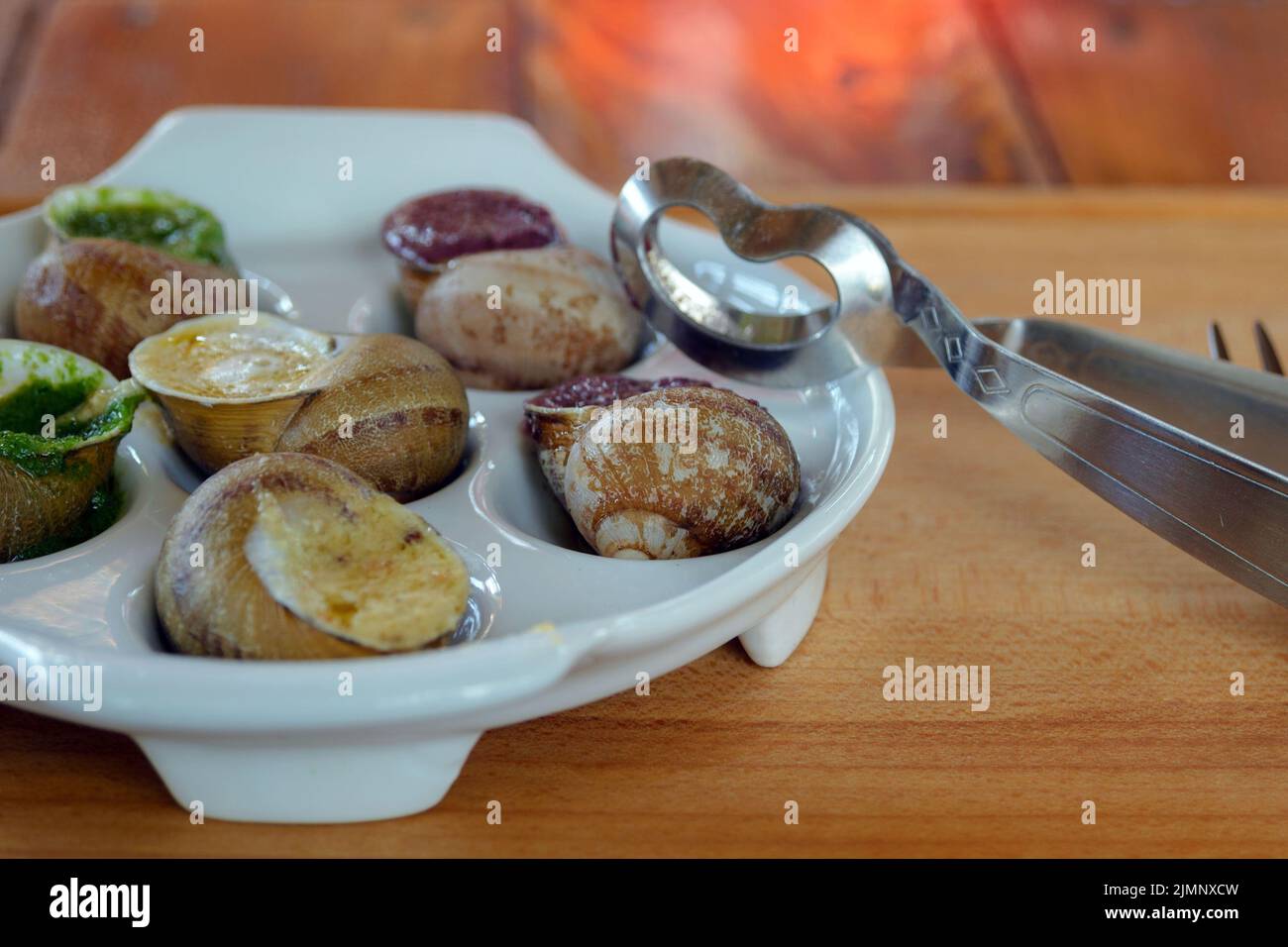 Gourmet, delicious escargo snack with butter, garlic and herbs. French ...