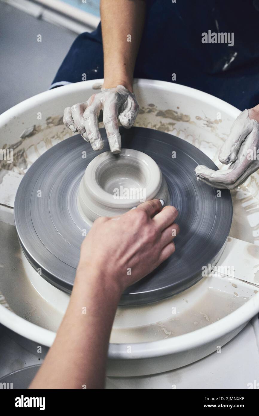 Pottery wheel hands hi-res stock photography and images - Alamy