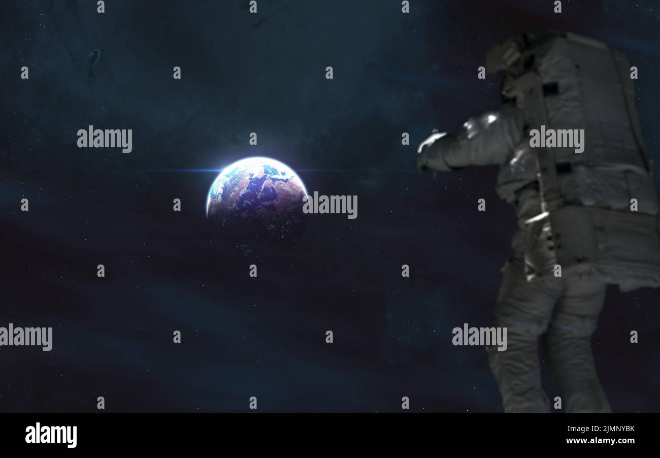 Lonely deep space planet. Astronaut out of focus Stock Photo - Alamy