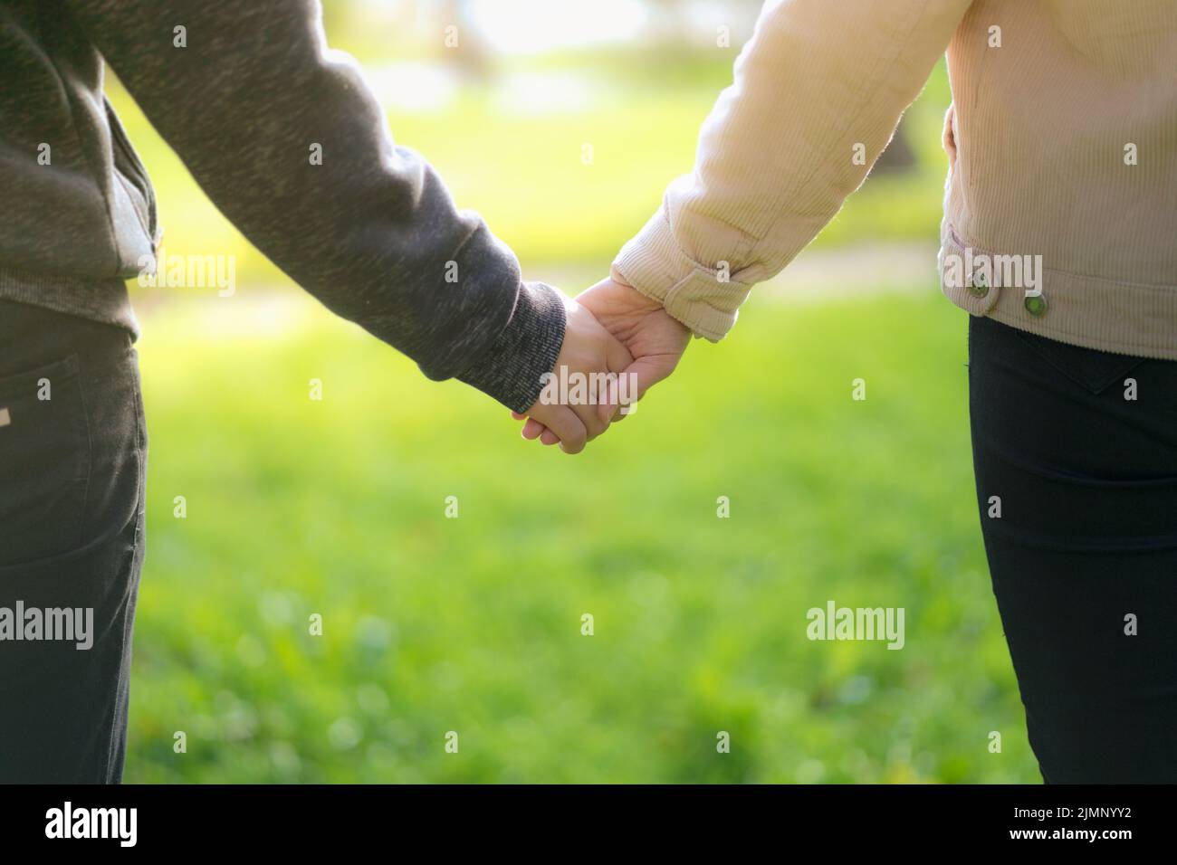A Man Next To Woman Guy And A Girl Are Standing Close Touching Each Other Holding Hands The