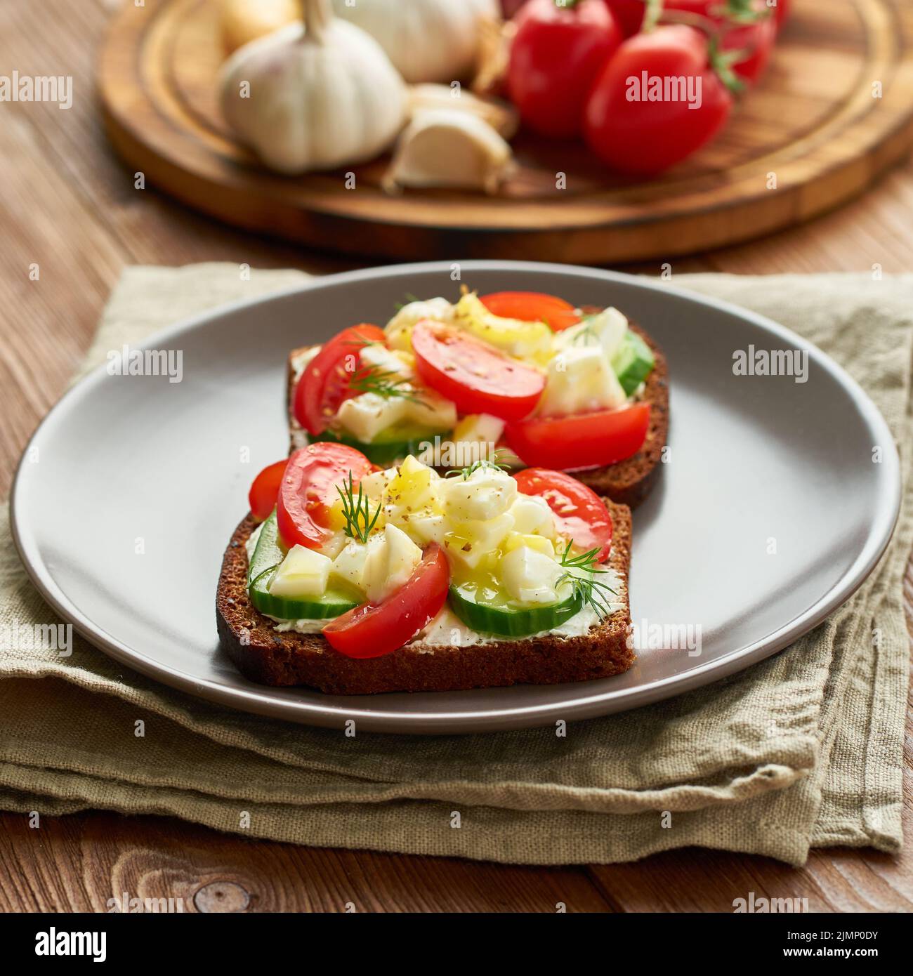 Smorrebrod - traditional Danish sandwiches. Black rye bread with boiled ...