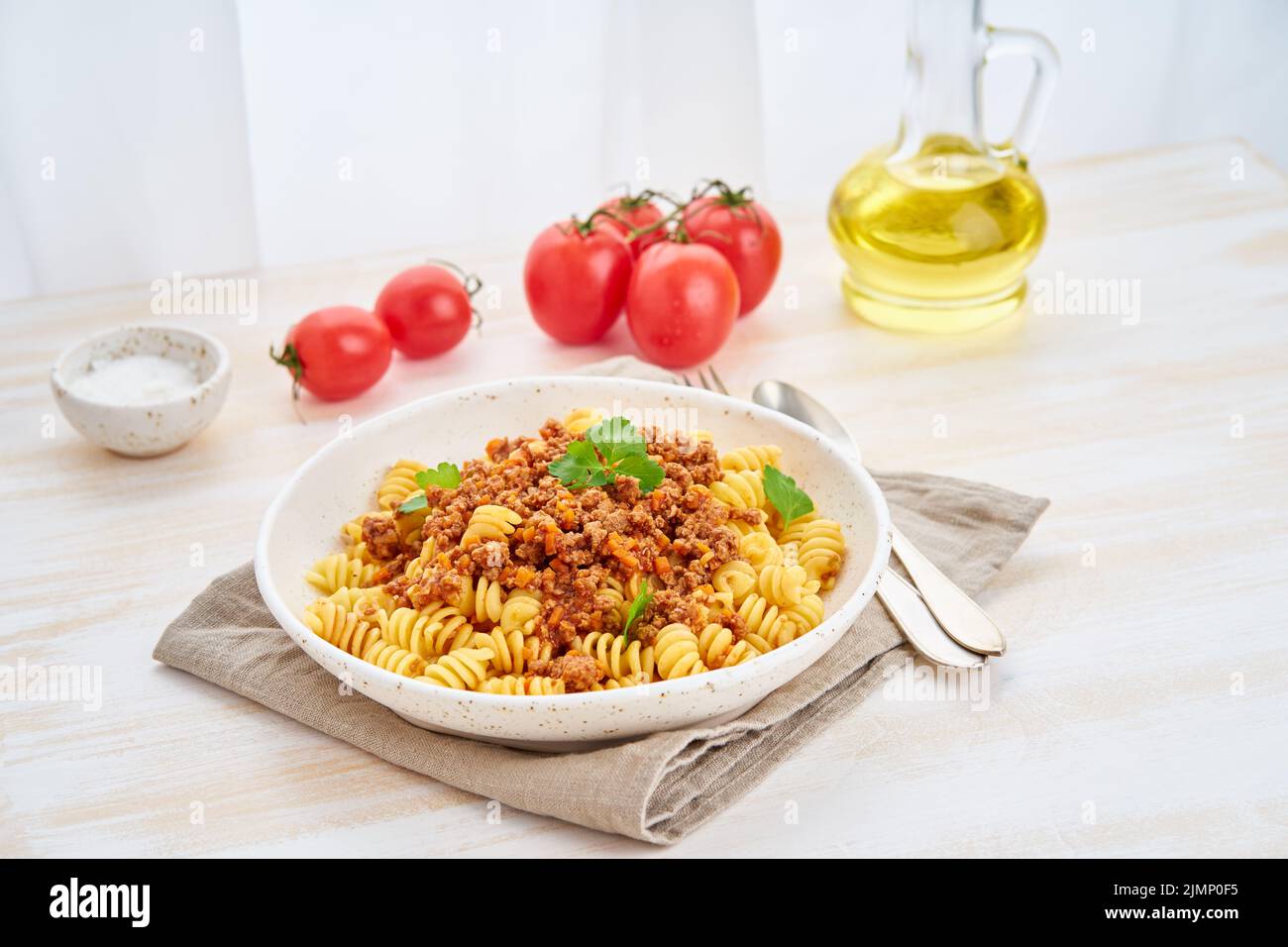 Bolognese pasta. Fusilli with tomato sauce, ground minced beef ...
