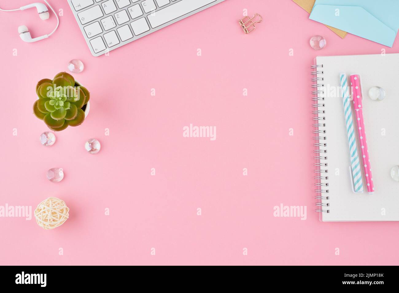 Part of blank notepad page in bullet journal on bright pink office ...