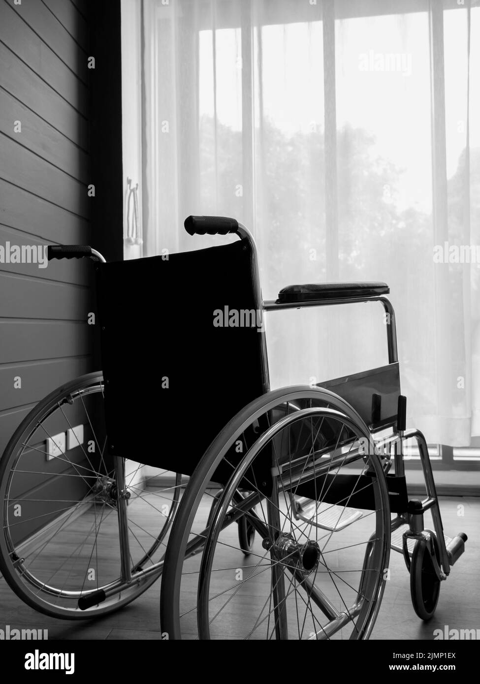 Patient back wheelchair Black and White Stock Photos & Images - Alamy