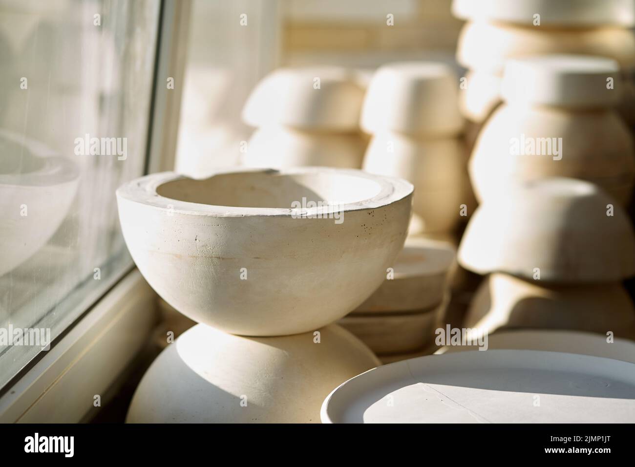 Manufacture of ceramic products, workpiece. Beautiful background with ...