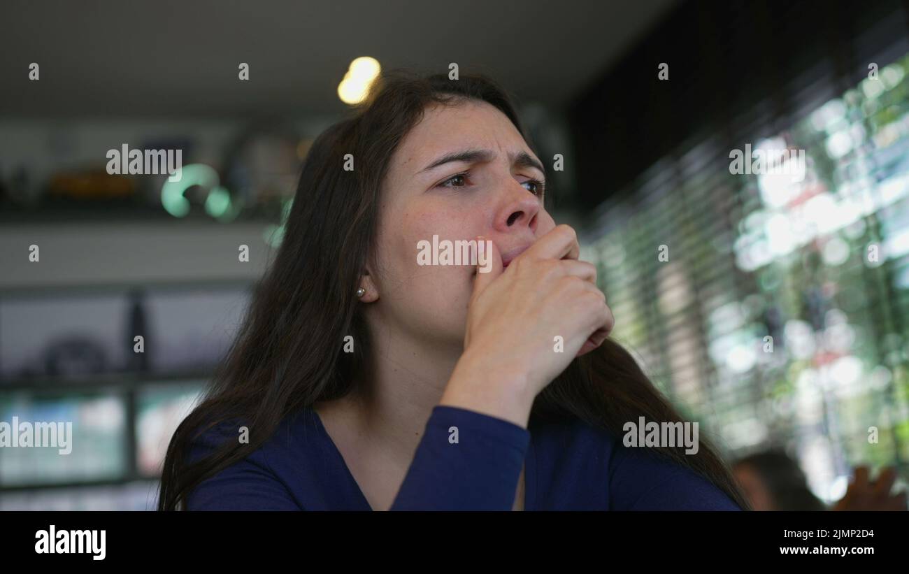 Woman with preoccupied emotion closeup face. Pensive thoughtful person ...