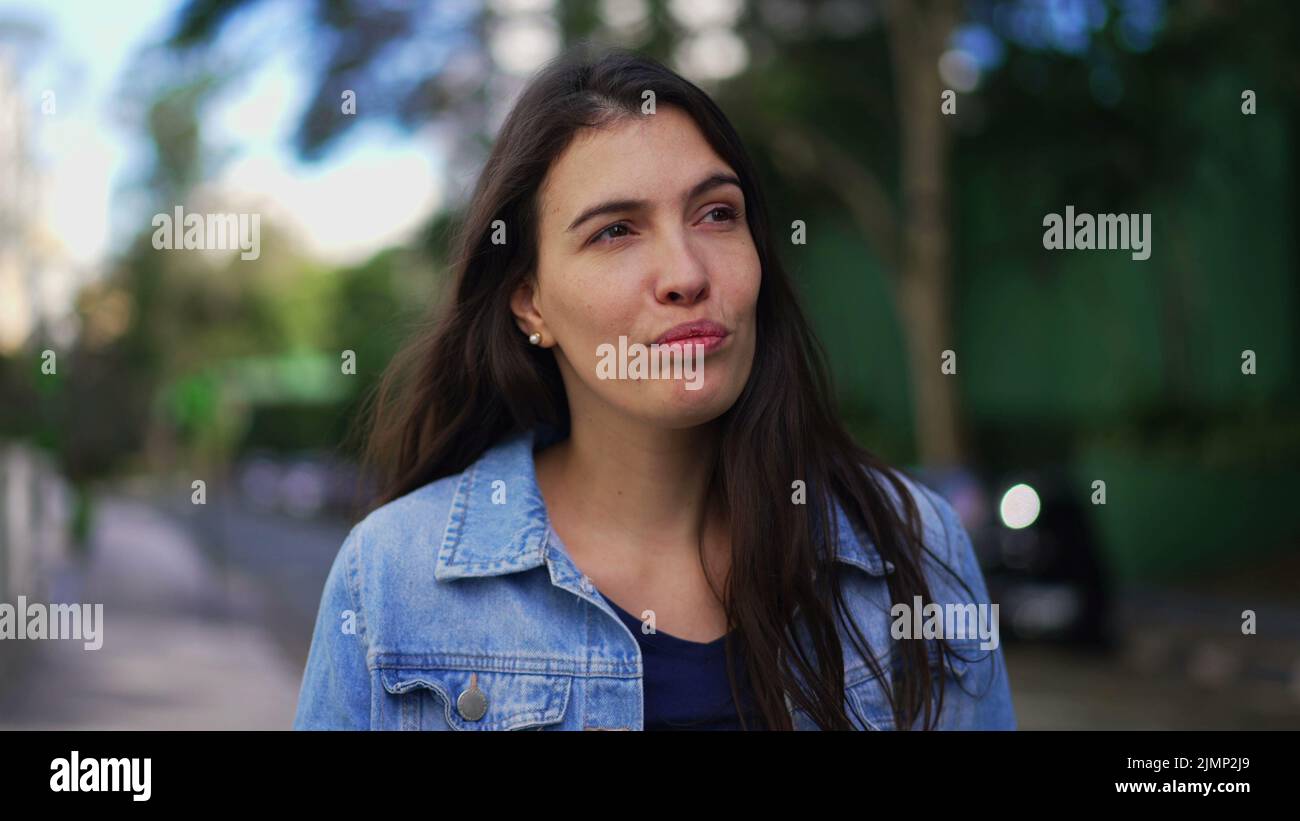 One thoughtful woman walking outside thinking. Closeup person face ...