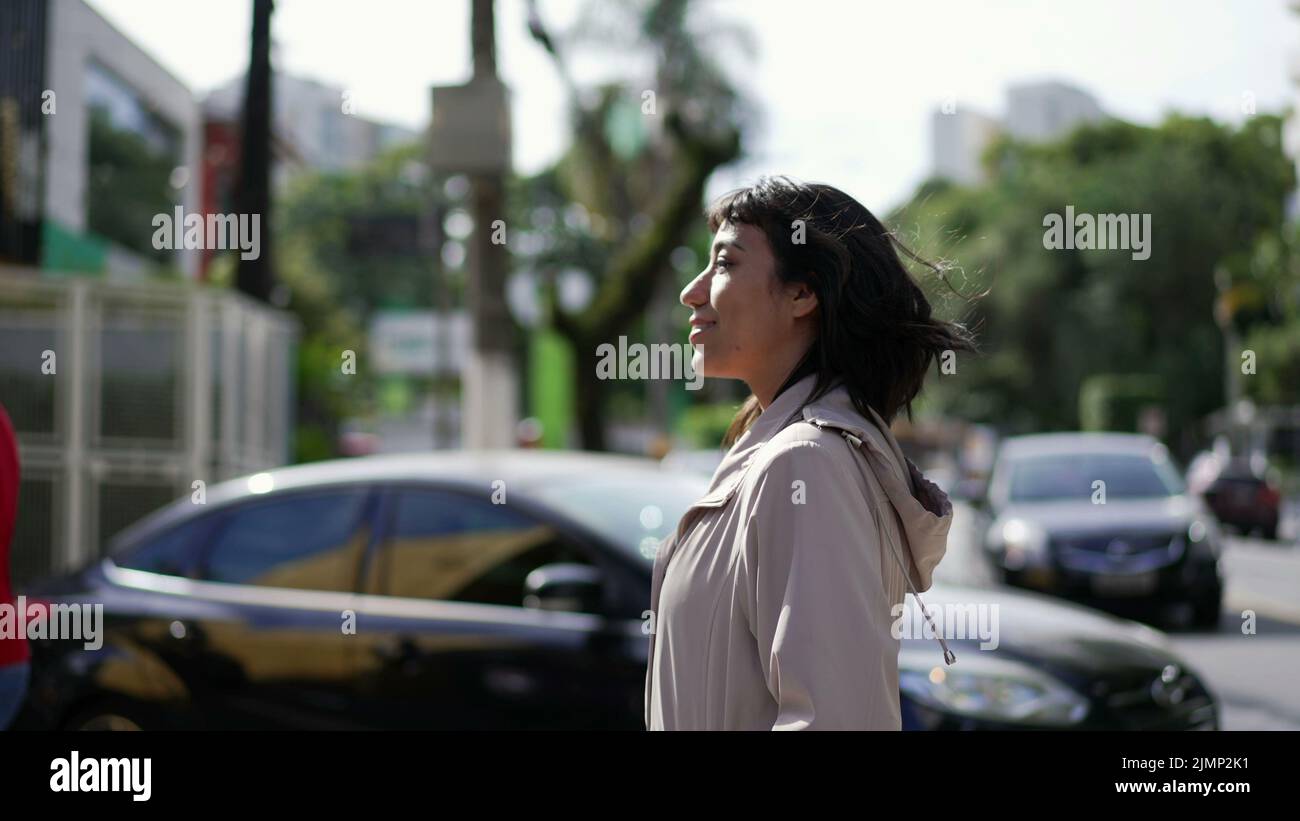 Person crosses downtown street hi-res stock photography and images - Alamy