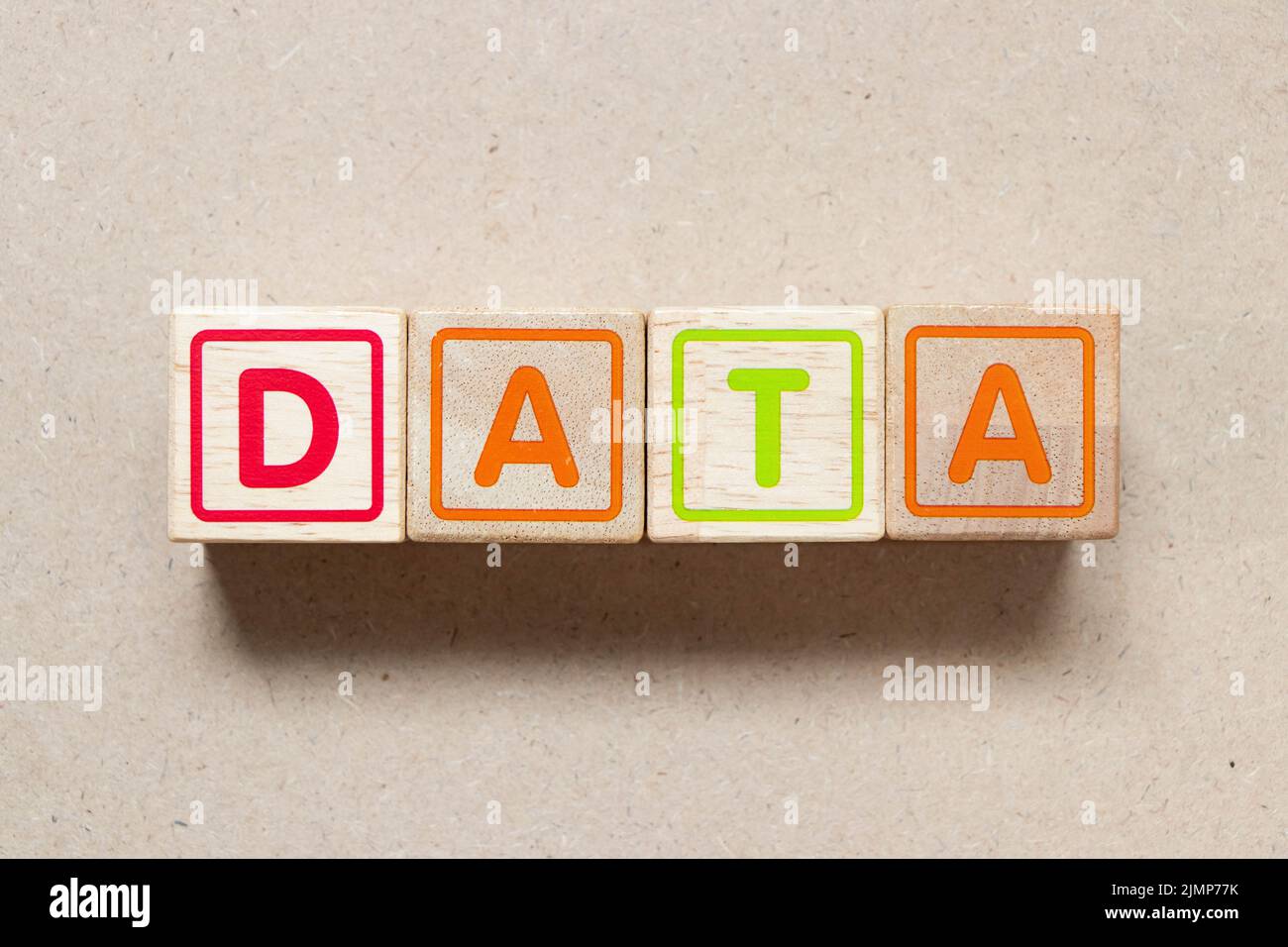 Color letter block in word data on wood background Stock Photo - Alamy