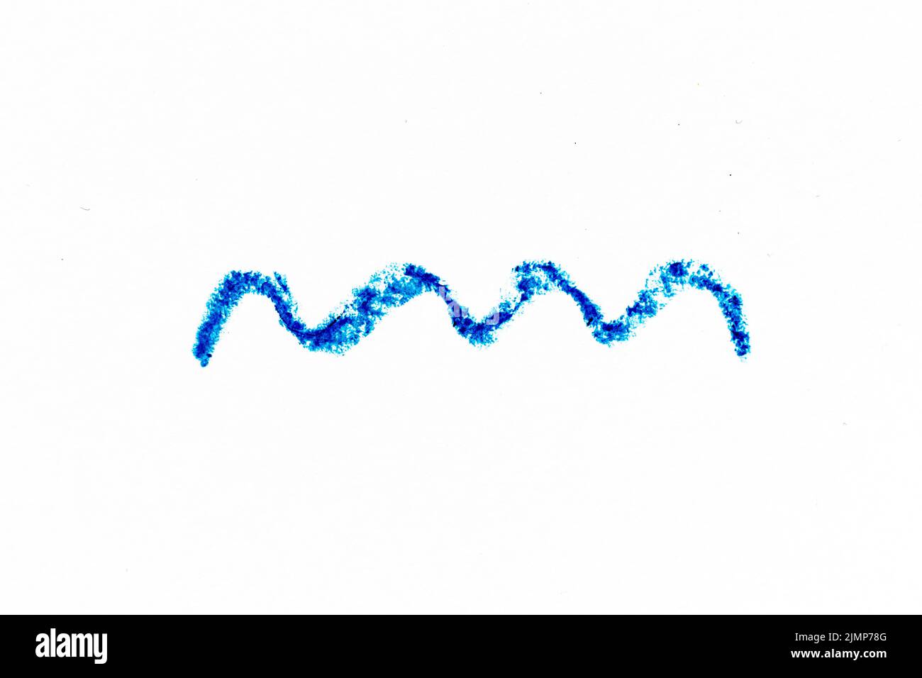 Blue color crayon hand drawing in zigzag line shape on white paper ...