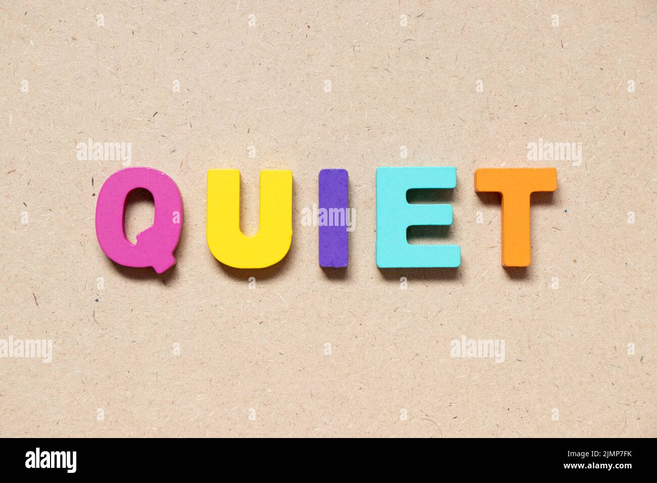 Color alphabet letter in word quiet on wood background Stock Photo - Alamy