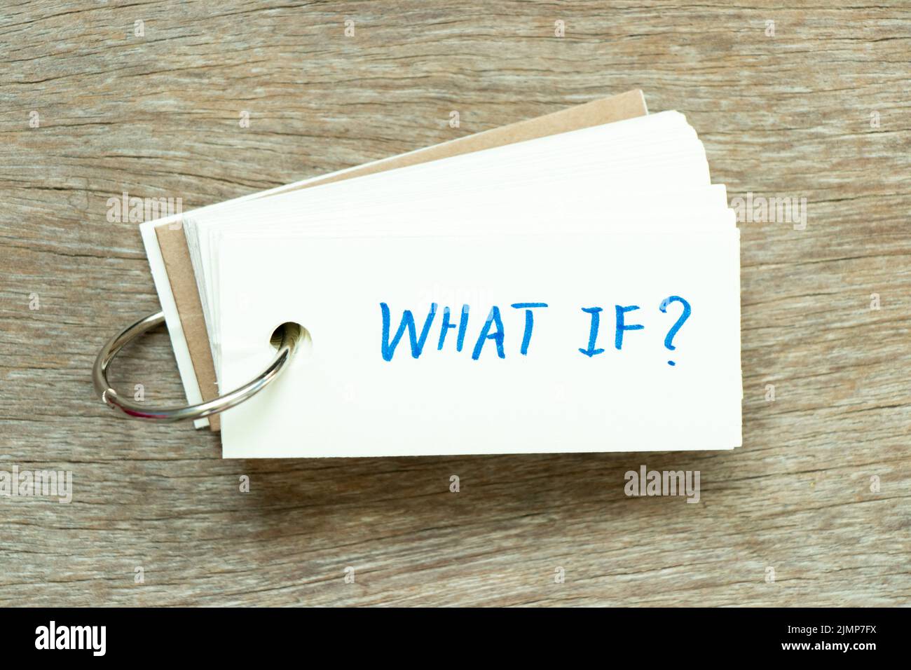 Flash card with handwriting word what if on wood background Stock Photo ...