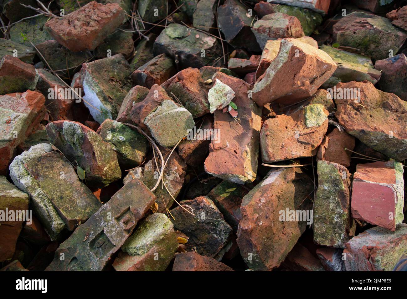 Old bricks scattered in the courtyard Textured background Stock Photo ...