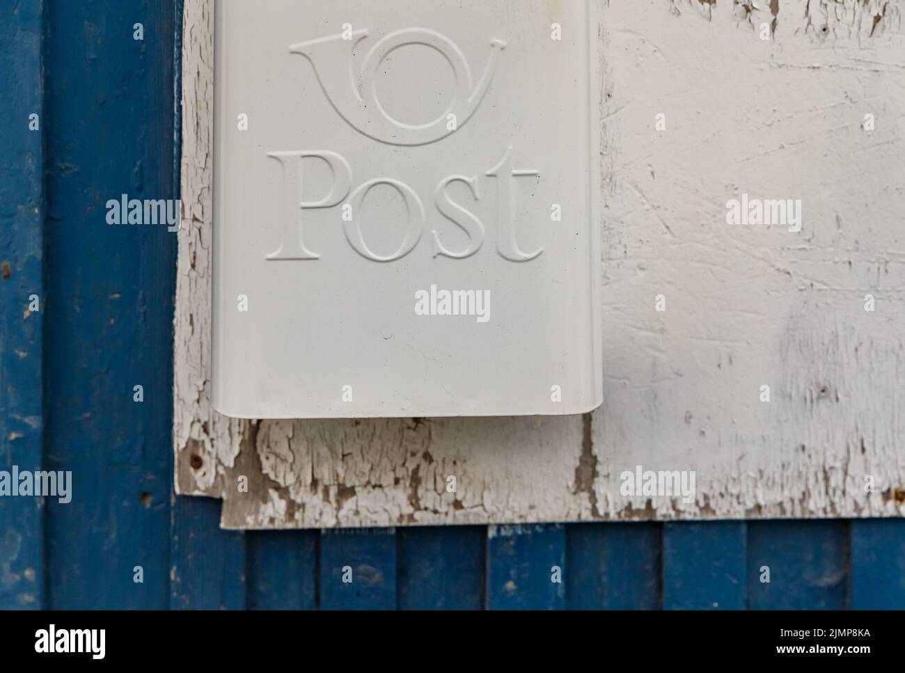 White mailbox on the wooden wall of the house of blue color Stock Photo ...