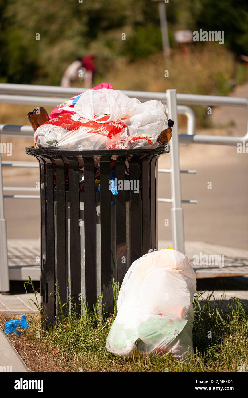 Dumpster being full with garbage Stock Photo - Alamy