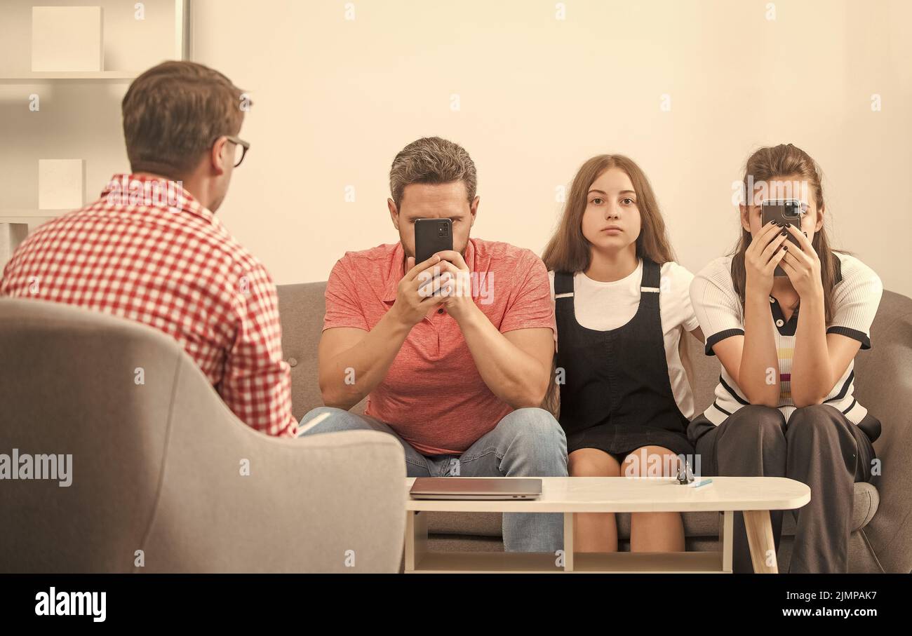 kid with phone addicted daddy and mom sitting at psychologist solving ...