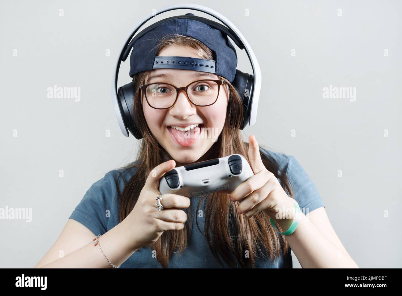 Girl playing video games Stock Photo - Alamy